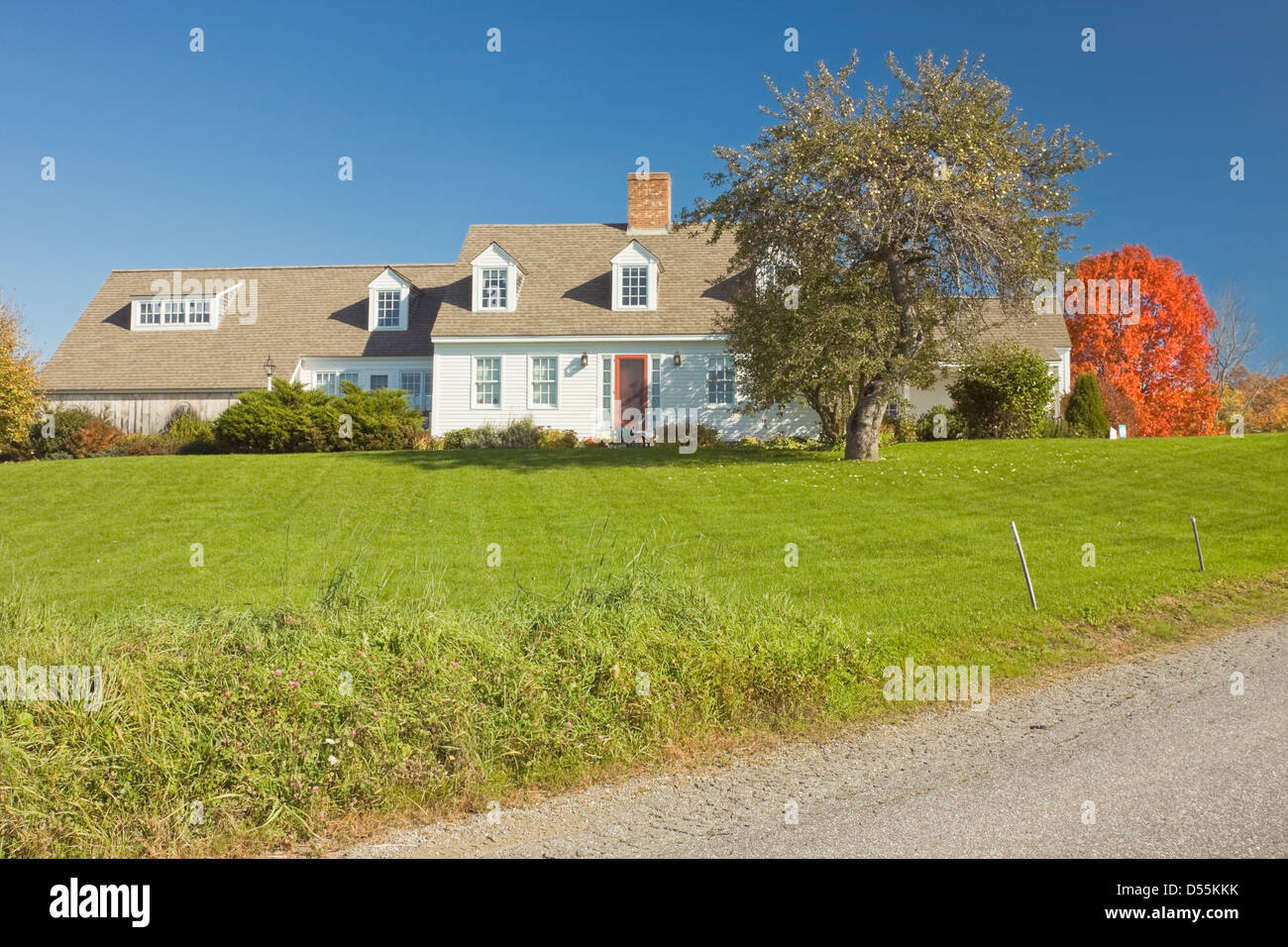 Cape Cod style house in Fall Stock Photo - Alamy