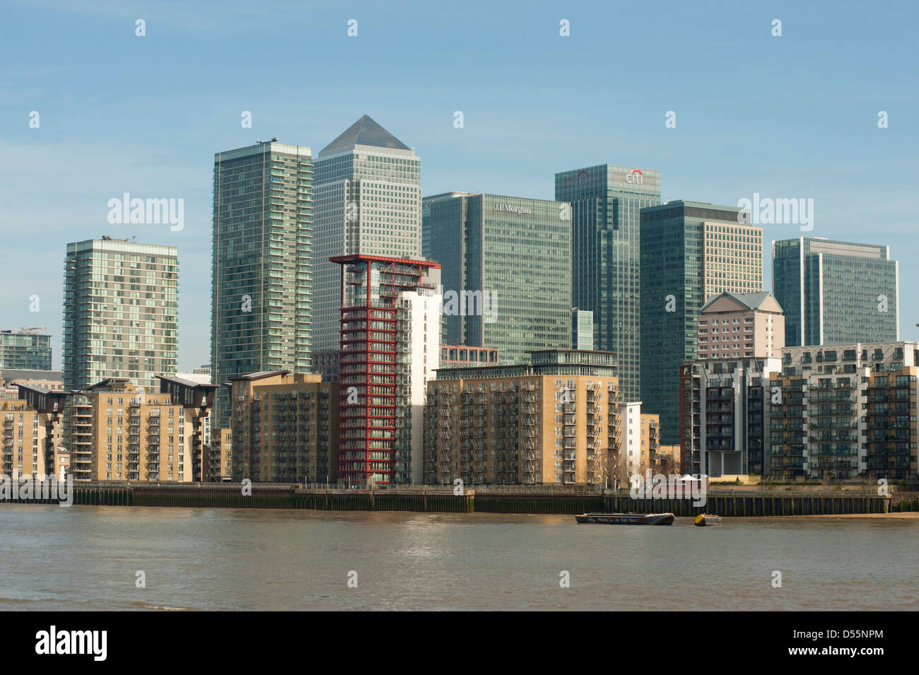 London Docklands development from the bank of the Thames at Rotherhithe ...