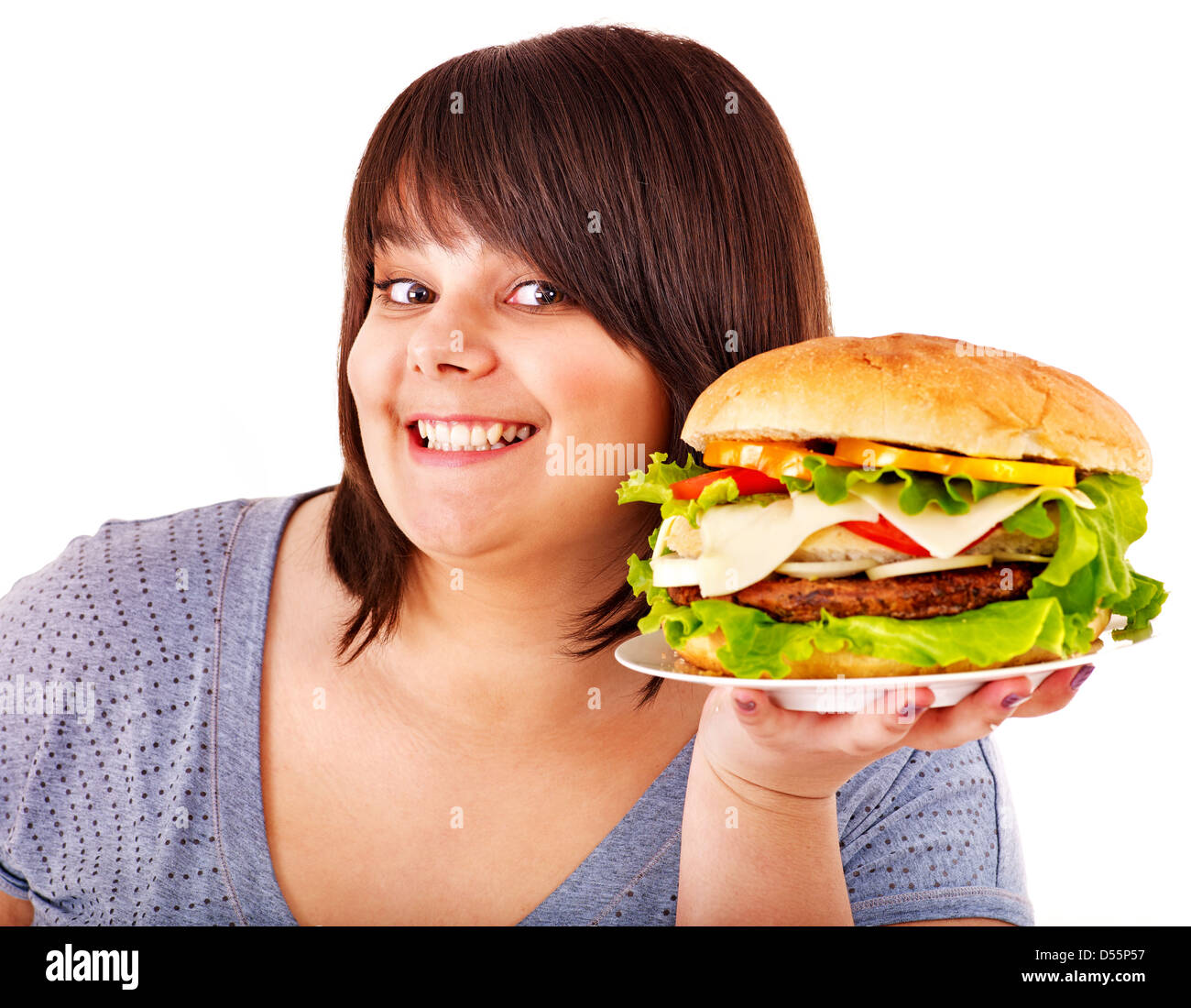 Overweight beautiful woman eating hamburger Stock Photo - Alamy