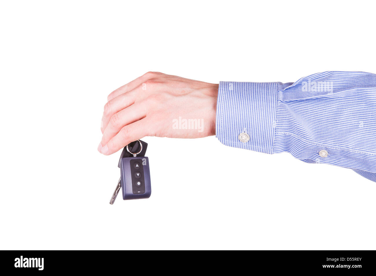 Male hand holding a car key isolated on white background. New car ...