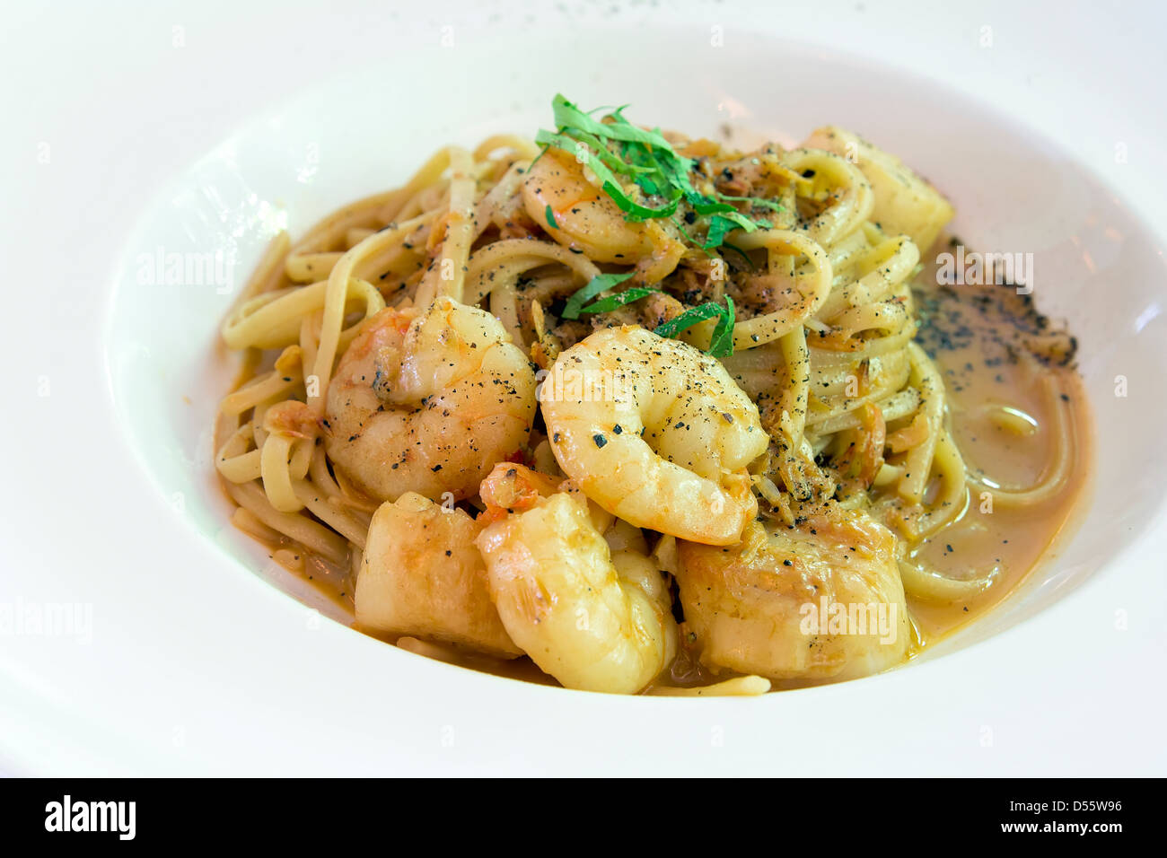Linguini with Pan Seared Tiger Prawns and Scallops in a Bisque Cream ...