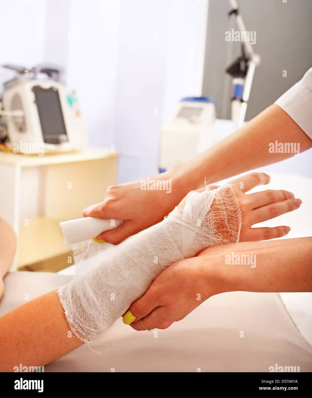 Bandaging hand patient in hospital Stock Photo - Alamy