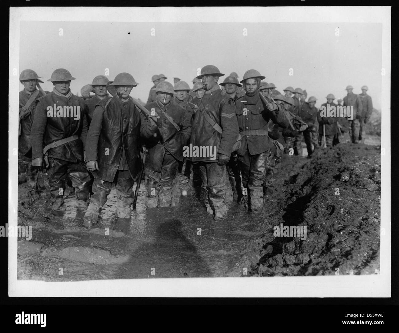 A war scene depicts soldiers in the muddy conditions of the battlefield ...