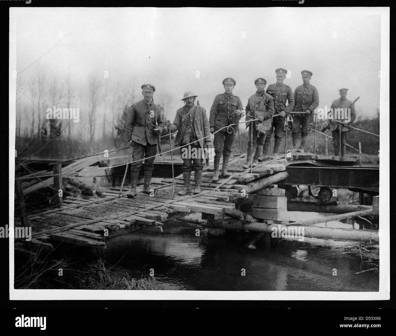 A temporary bridge constructed by the Royal Engineers (R.E.s) over the ...