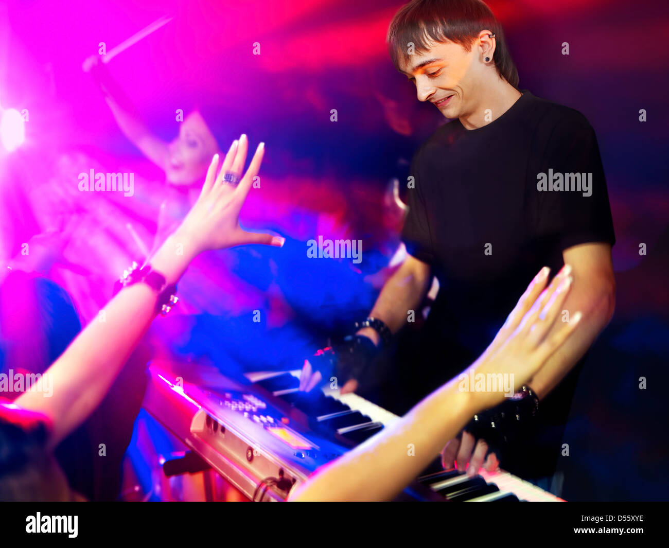 Musical group performance in night club Stock Photo - Alamy