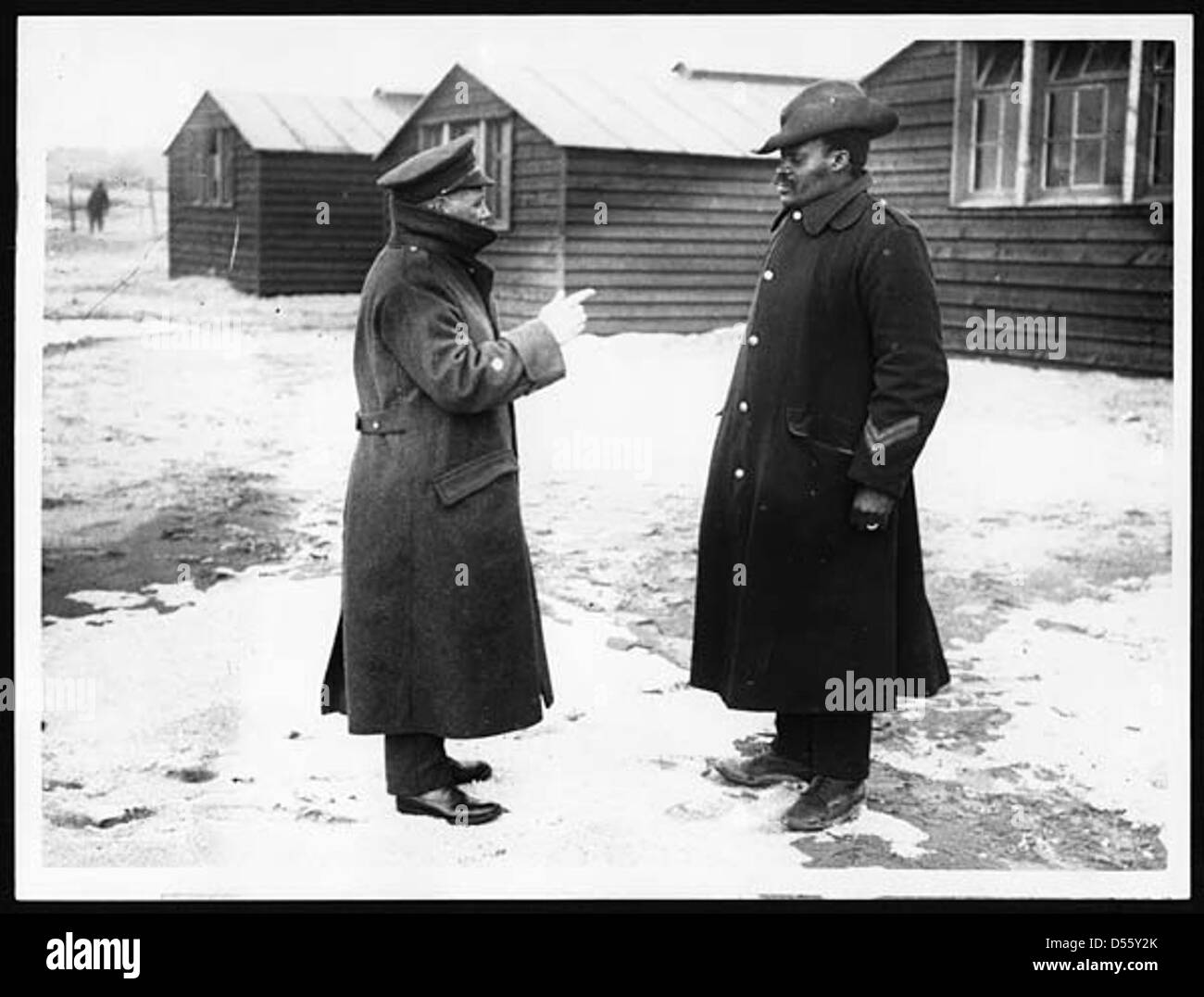 A British officer (S.M.) provides instructions to a native policeman ...