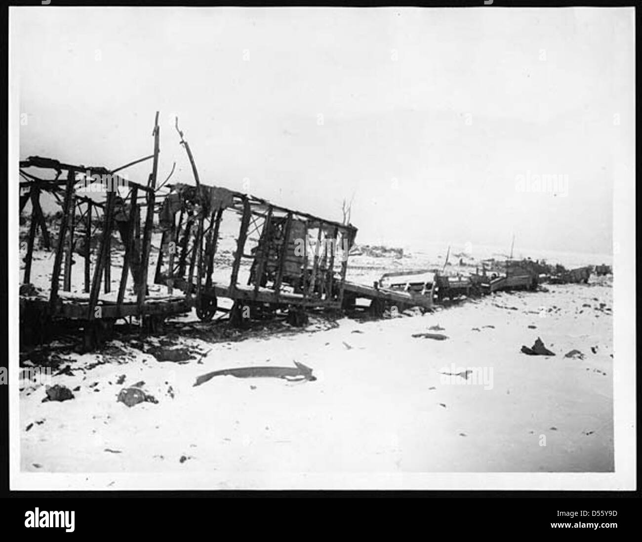 A train is destroyed by Allied shellfire, demonstrating the widespread ...