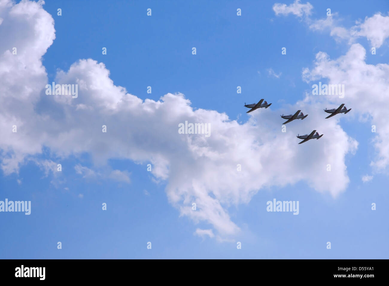 Aircraft squadron flying in the cloudy sky Stock Photo - Alamy