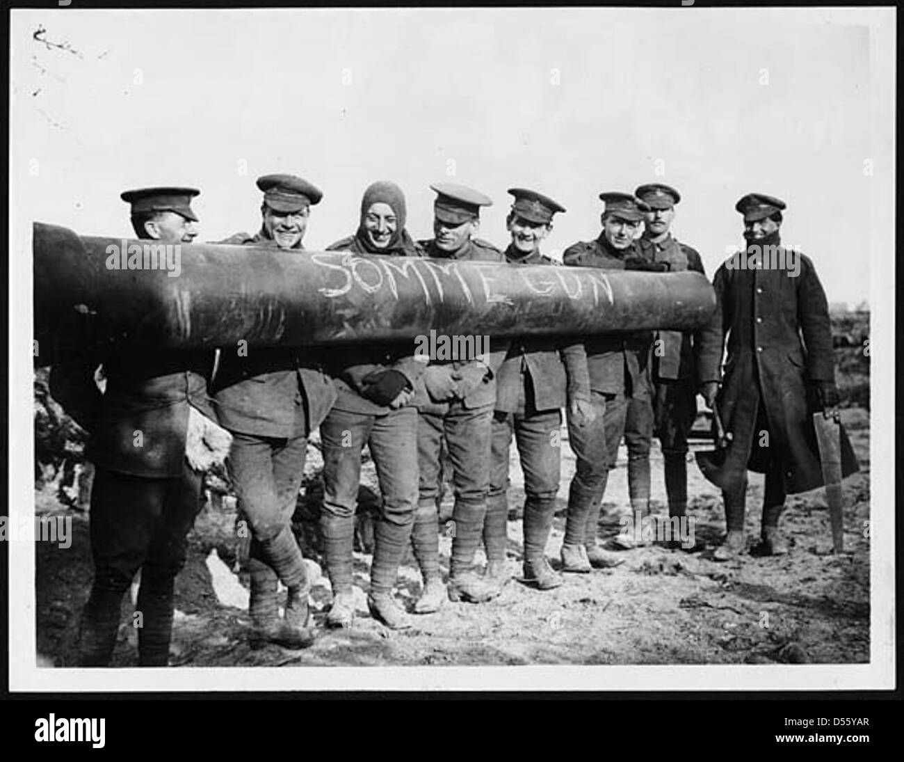 Artillery gunners share a jovial moment with their pet during World War ...