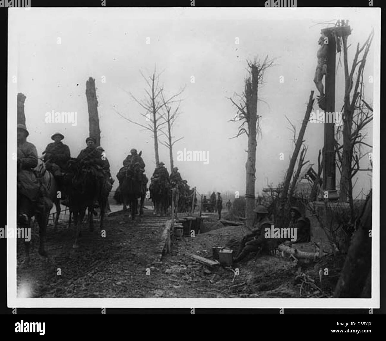 Cavalry troops crossing a temporary bridge during a military operation ...