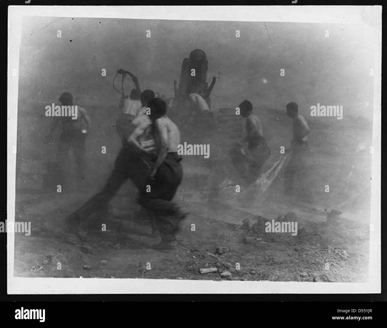 Soldiers serve the guns, loading and maintaining artillery during World ...