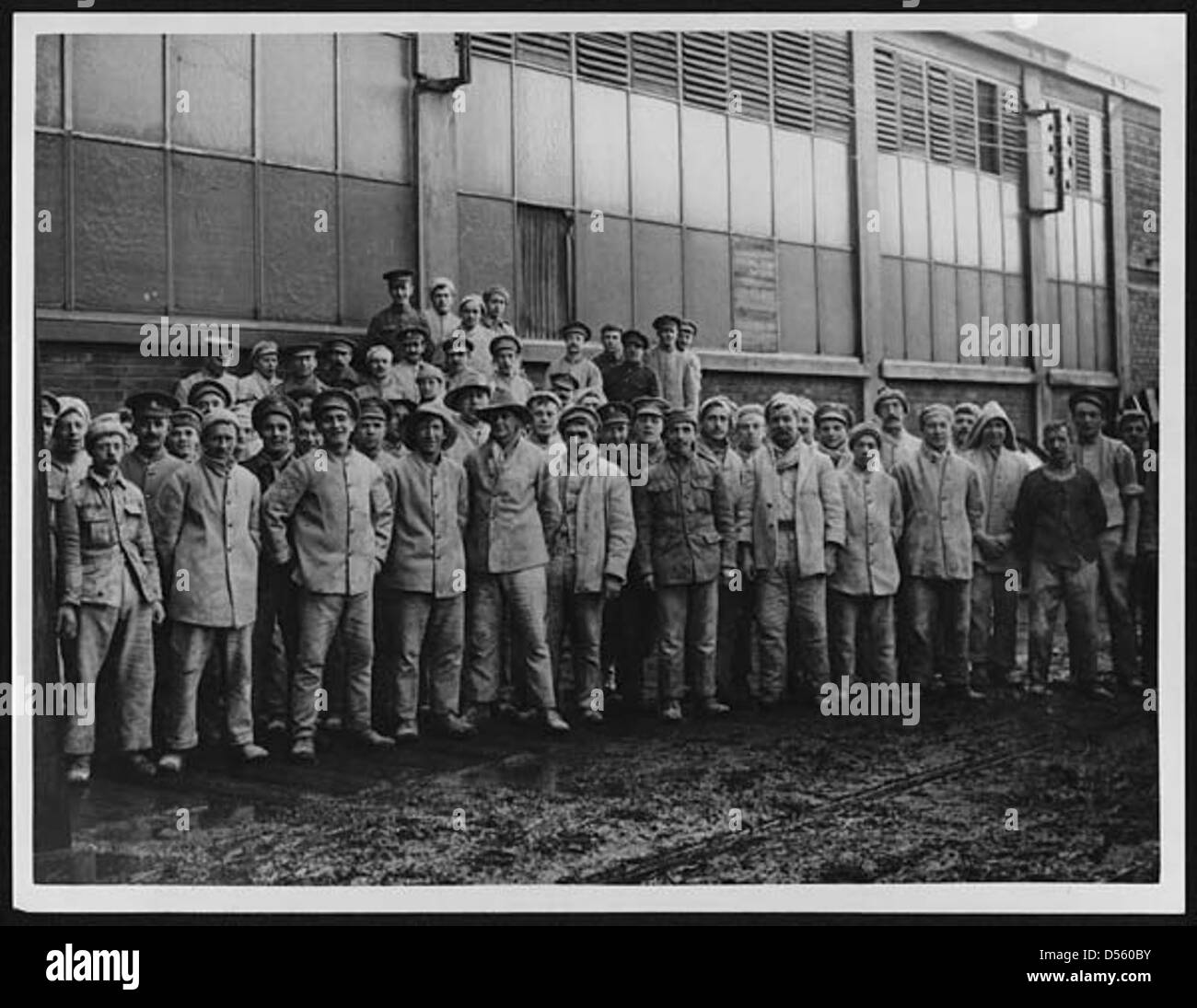 A small group of soldiers involved in baking bread during World War I ...
