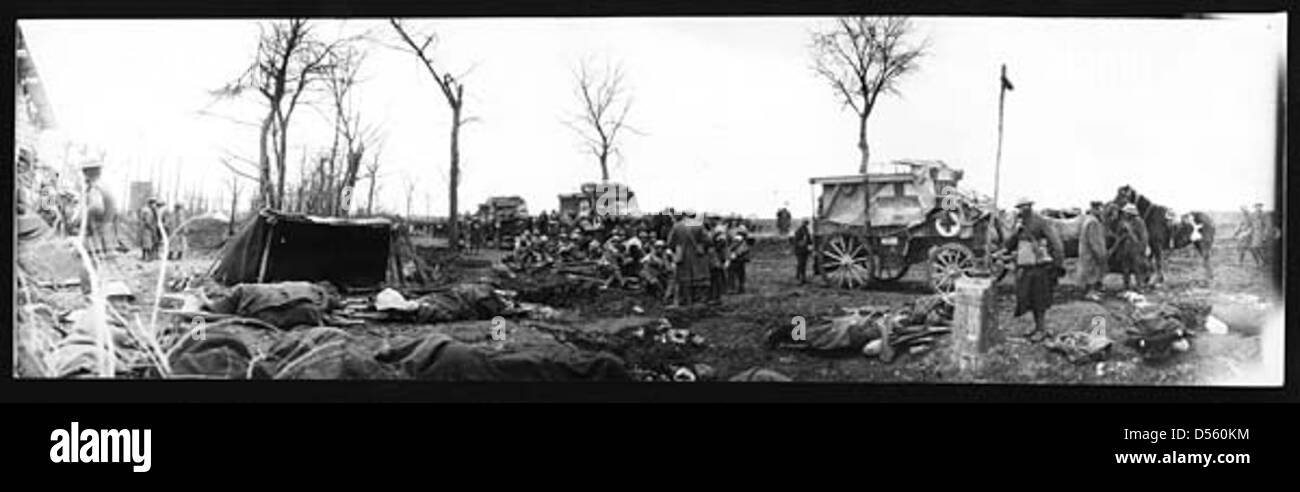 A view of soldiers and medical personnel near an advanced dressing ...