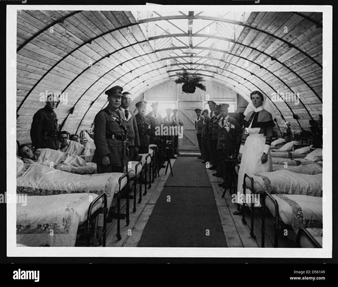 A Nissen hut, a prefabricated structure, is used as a hospital ward ...
