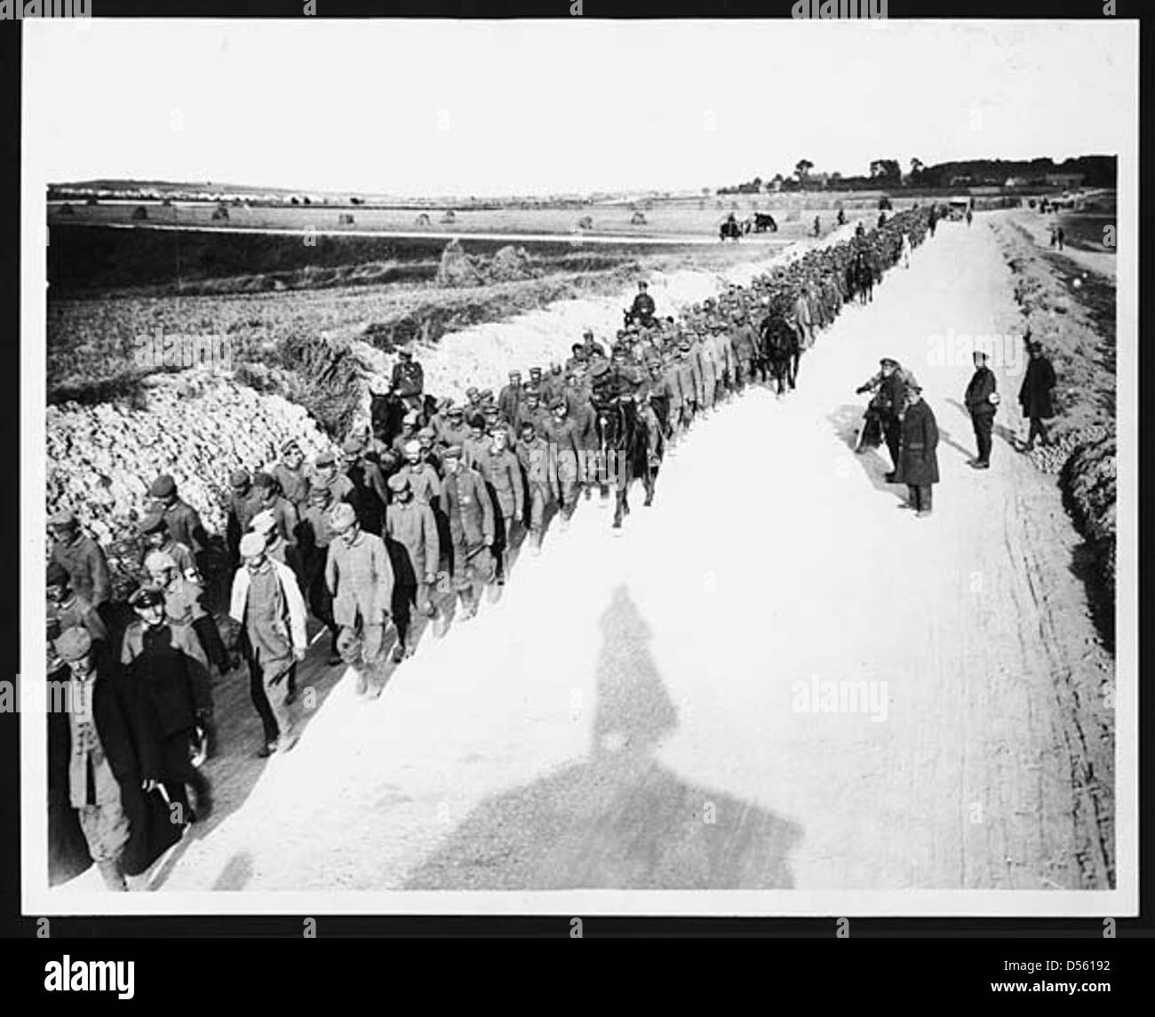 Prisoners of war are shown during World War I, captured by enemy forces ...