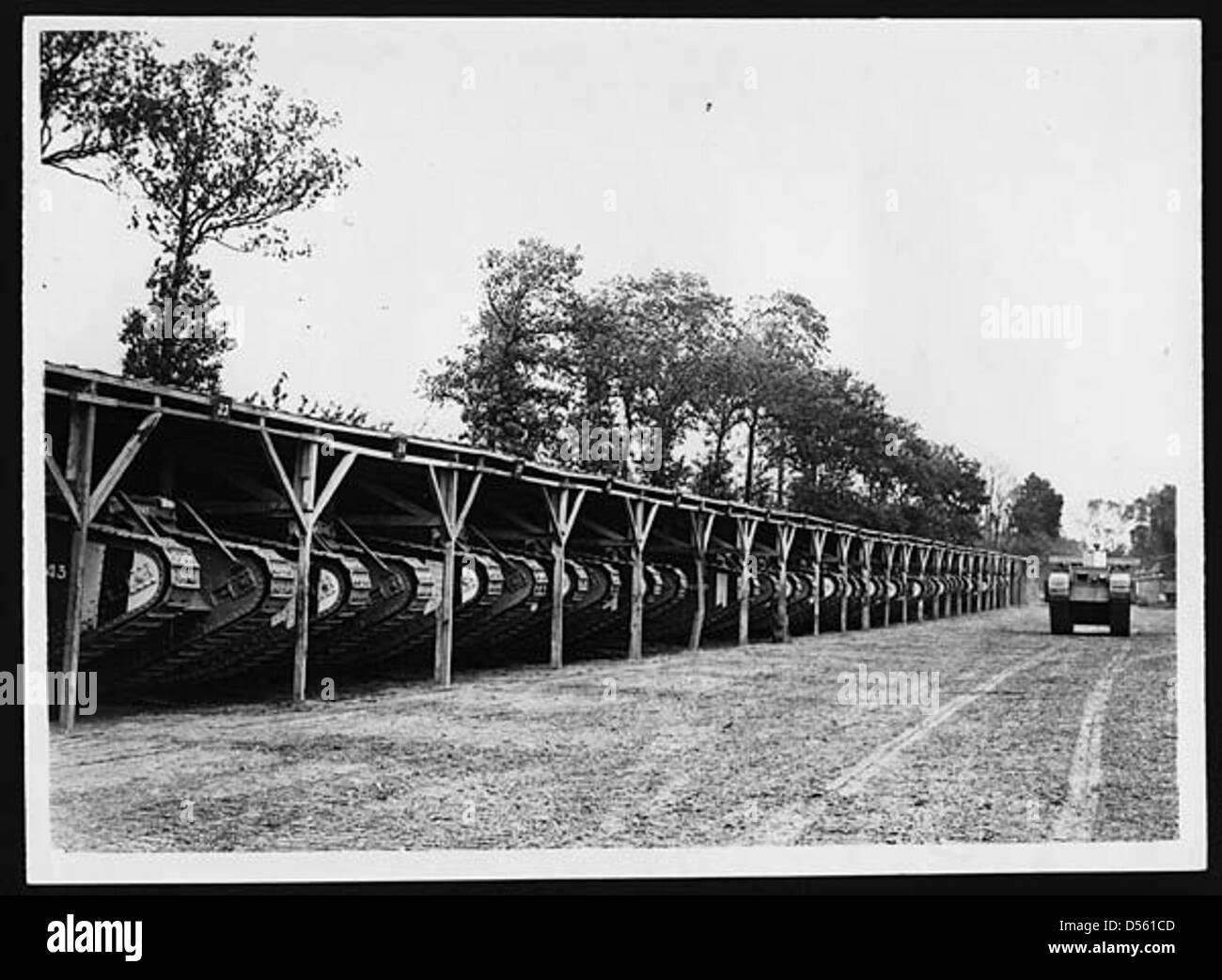 The image shows several stables used to house tanks during World War I ...