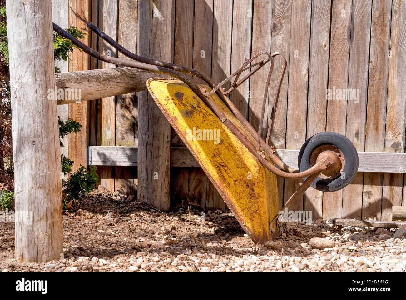 Very old Wheel Barrel stored and waiting to be used Stock Photo - Alamy