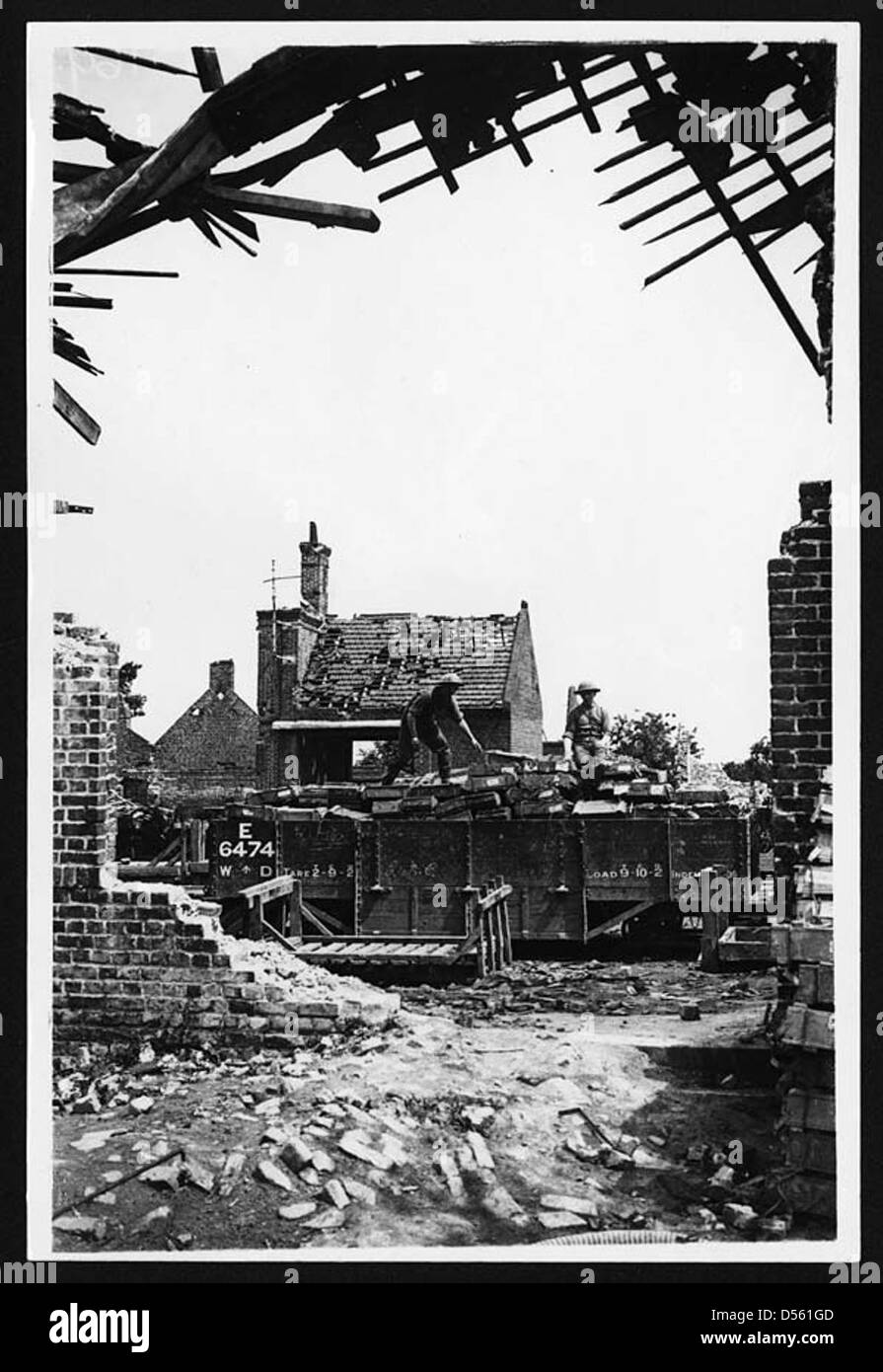 A view through a house damaged by shellfire, showcasing the destruction ...