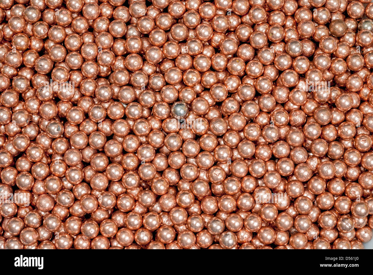 Small brass balls forming patterns Stock Photo - Alamy