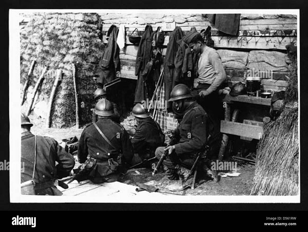 Soldiers cleaning up or maintaining their equipment, showcasing the ...