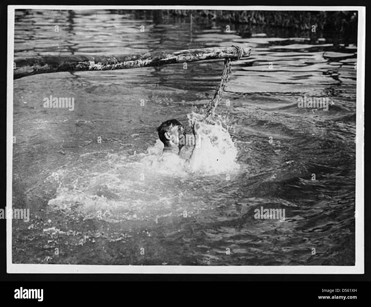 A greasy pole competition, a recreational activity during World War I ...