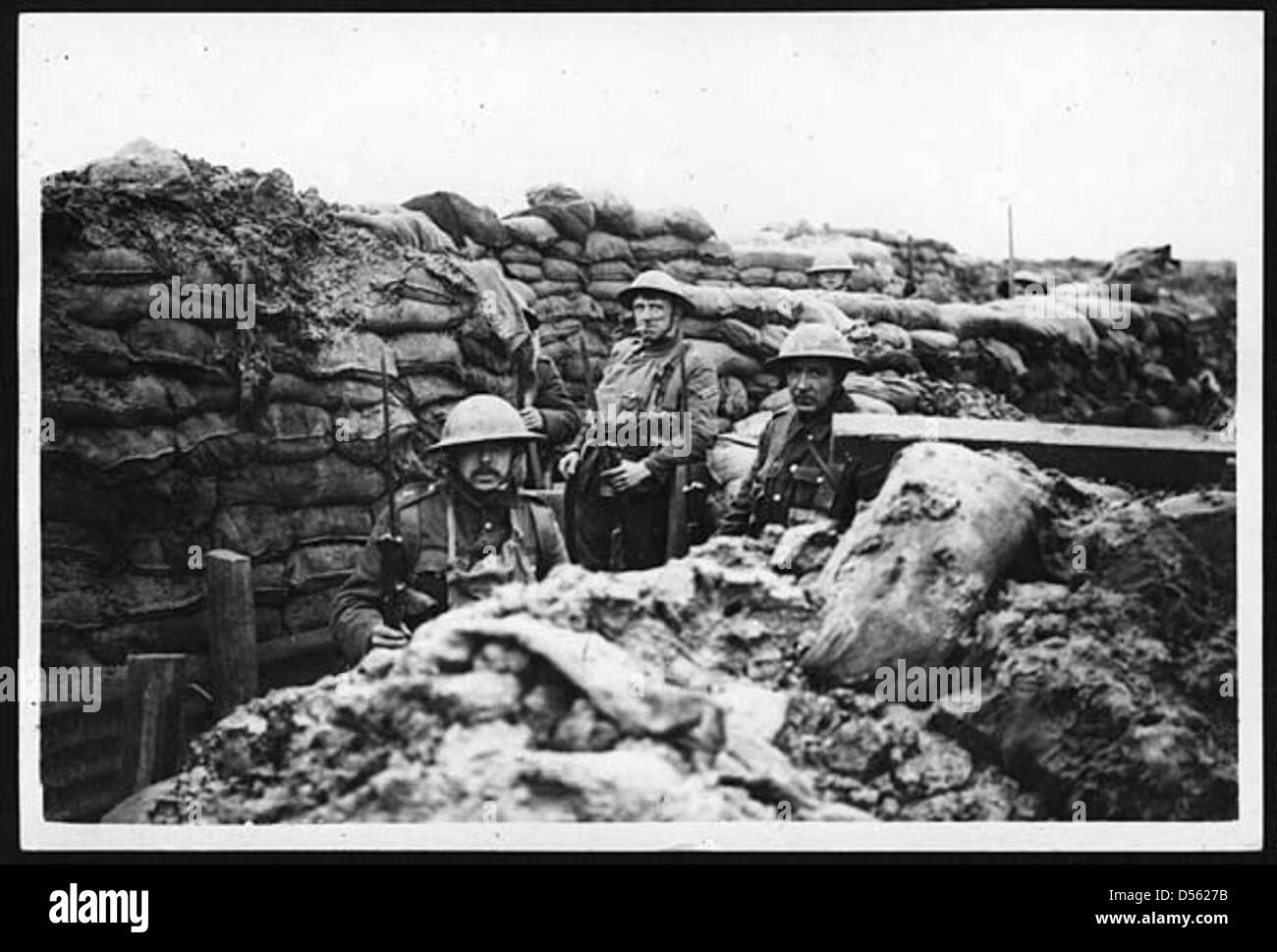 A scene captured in a World War 1 frontline trench, showing soldiers in ...