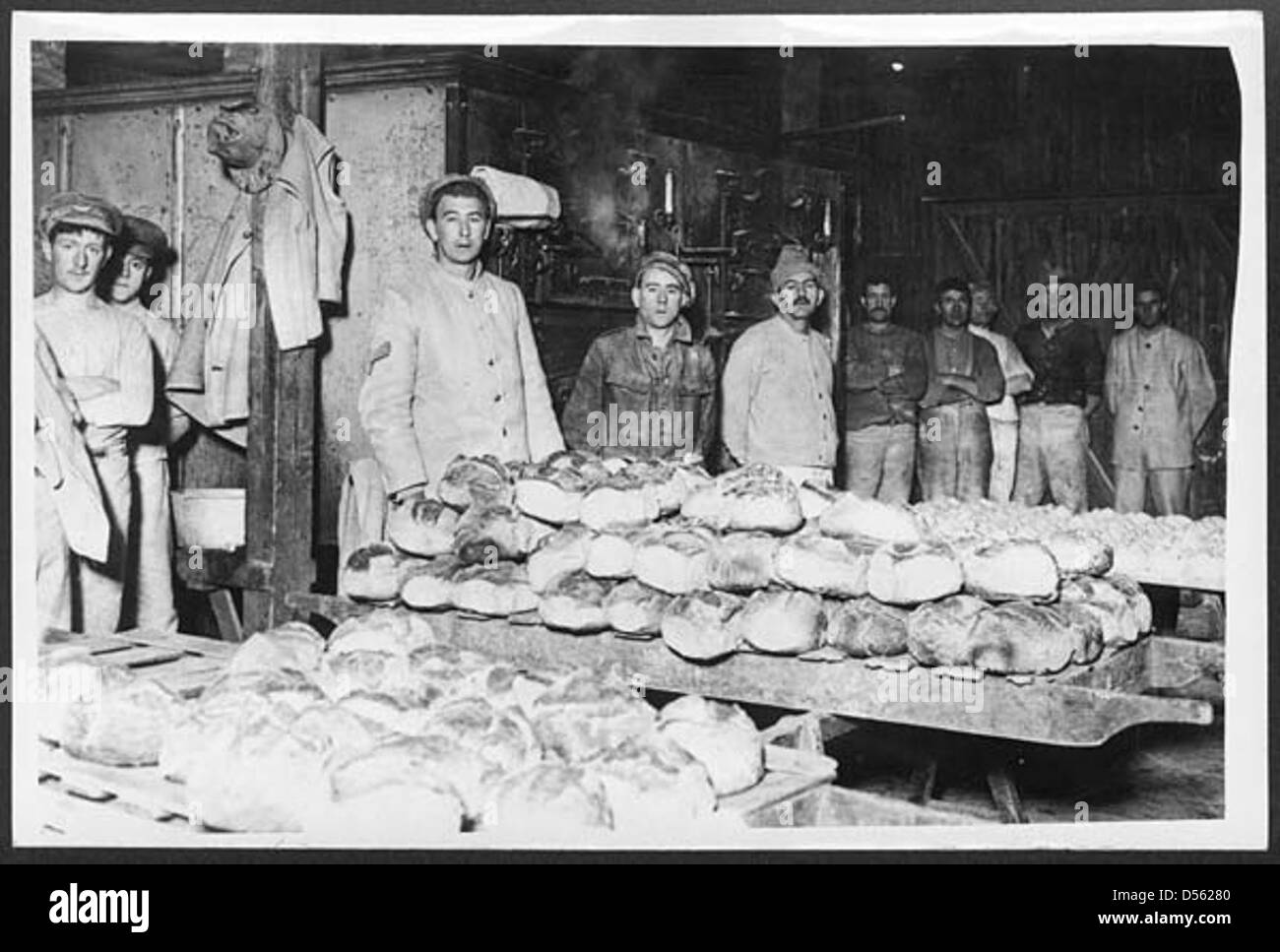 An oven with trays of freshly baked bread is displayed, illustrating ...