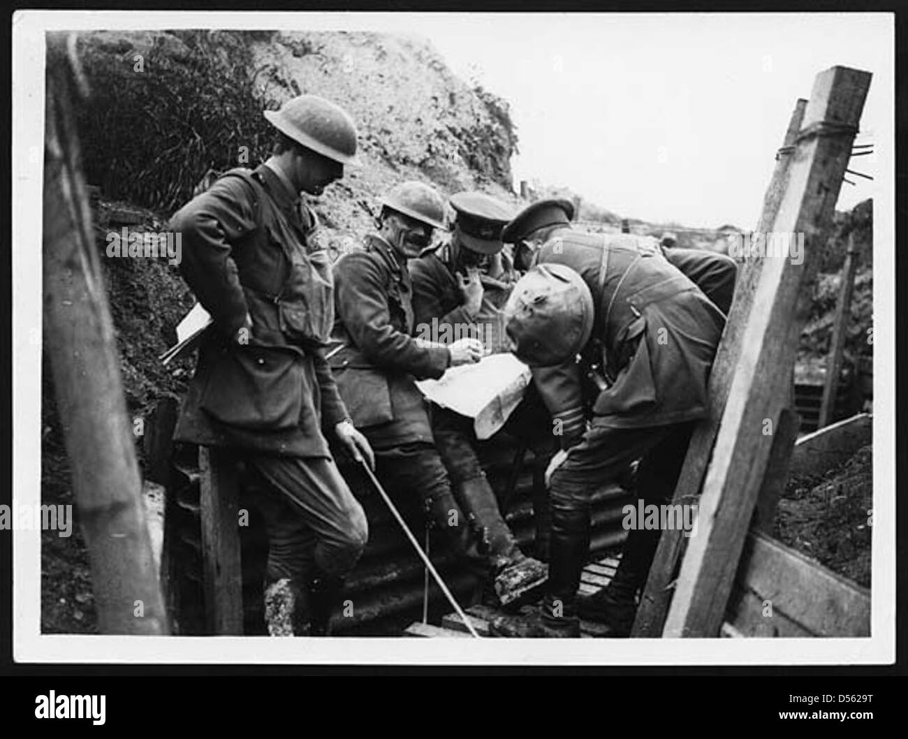 Two generals discuss a defense strategy in a trench during World War I ...
