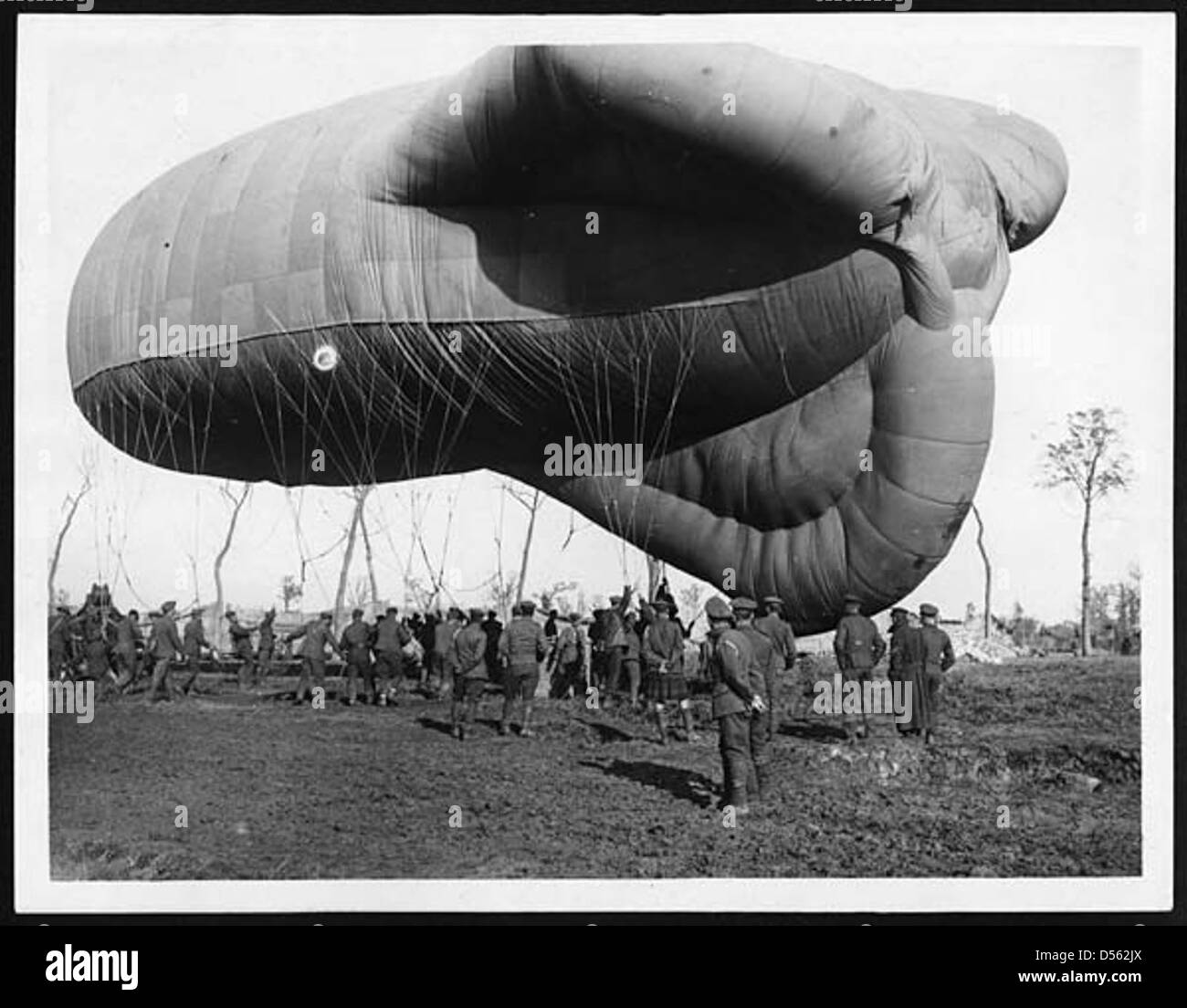 An observation balloon descends after completing a reconnaissance ...