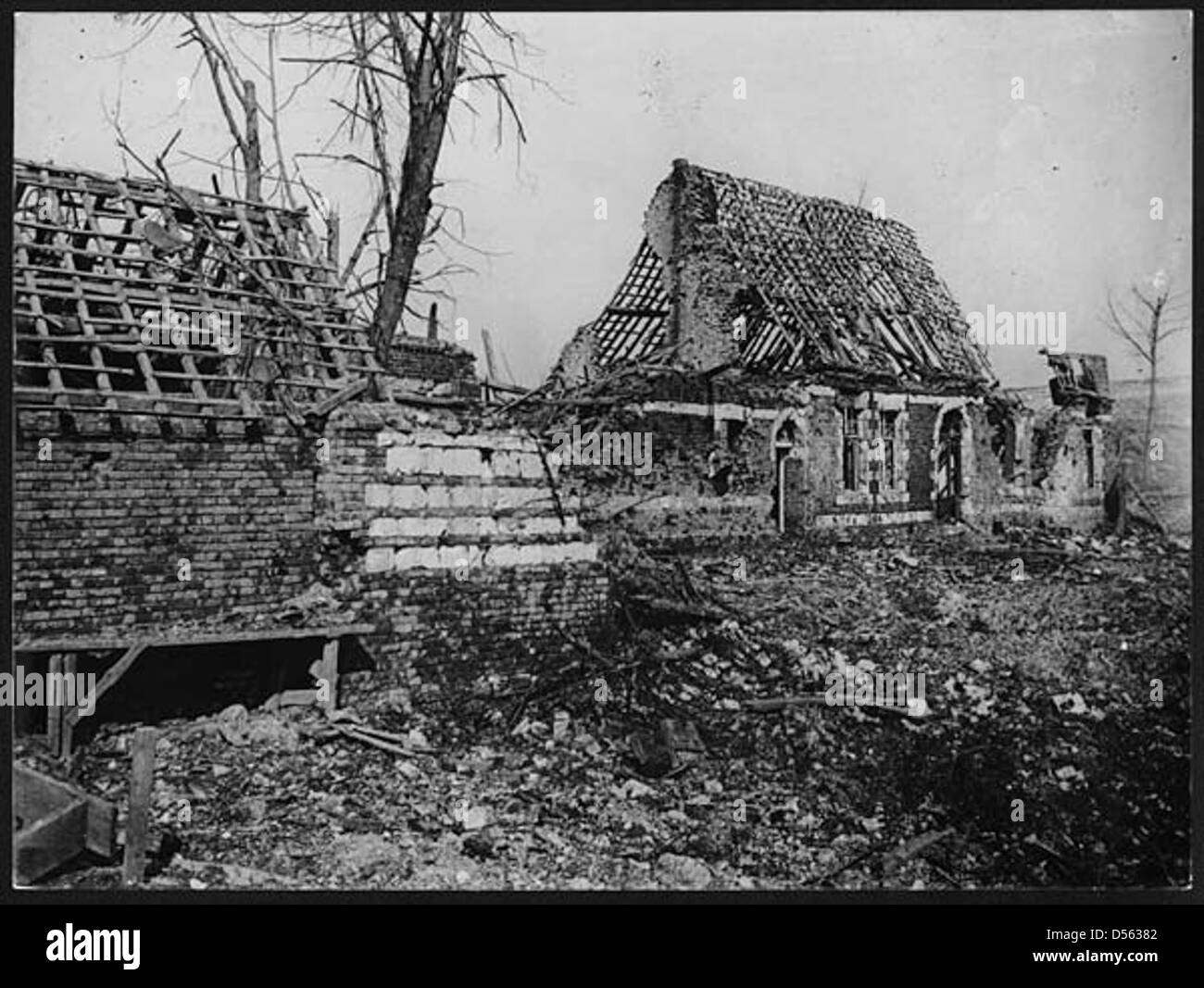 The aftermath of battle is shown with wrecked houses in a war-torn ...