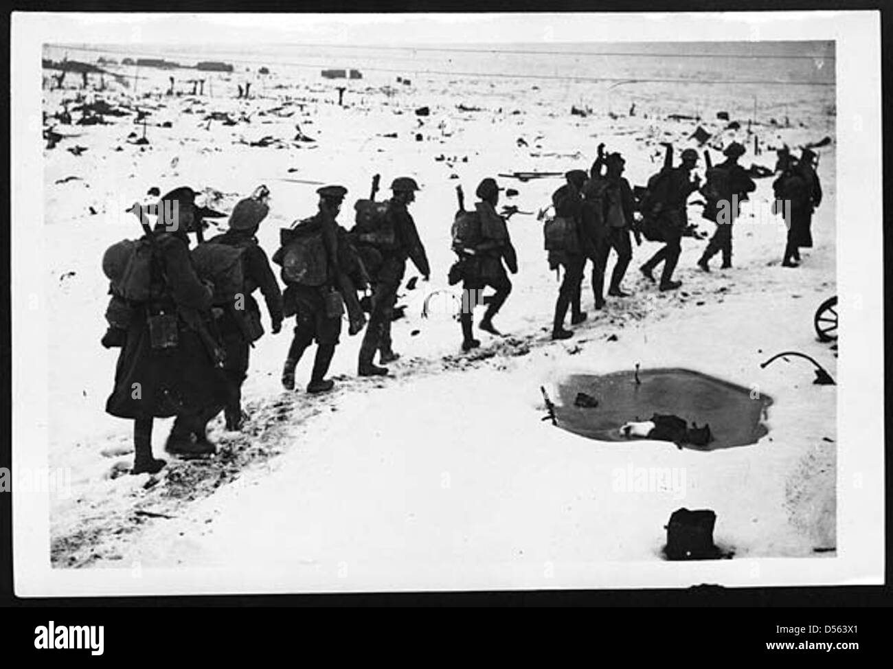 Infantry troops march through the snow during World War I. Harsh winter ...