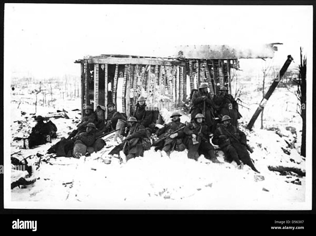 Soldiers rest while on their way to the trenches during World War I ...