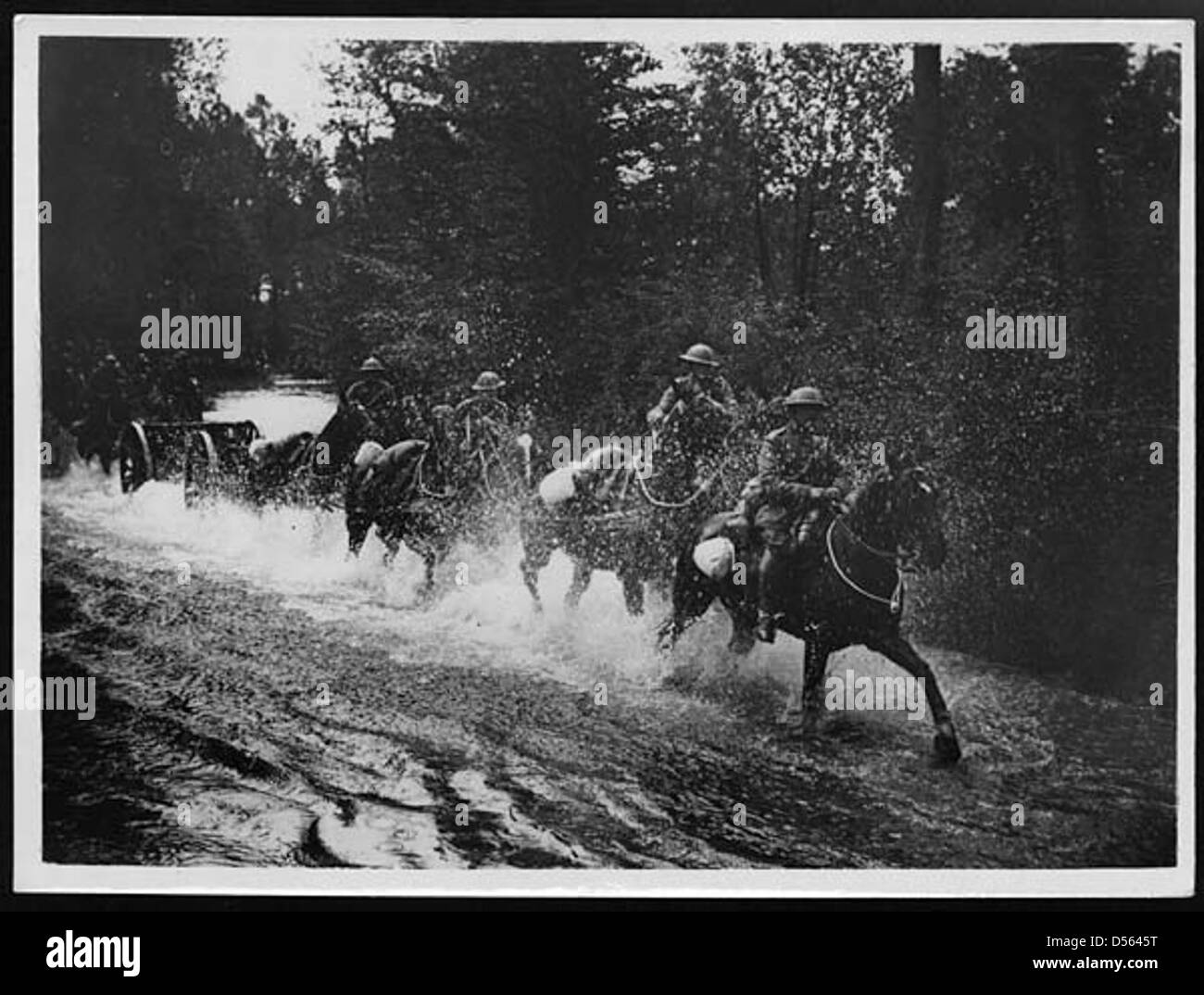 Royal Horse Artillery (R.H.A.) units cross a river at full gallop ...