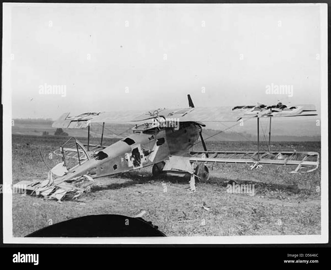 A German aeroplane is seen after being brought down during World War I ...
