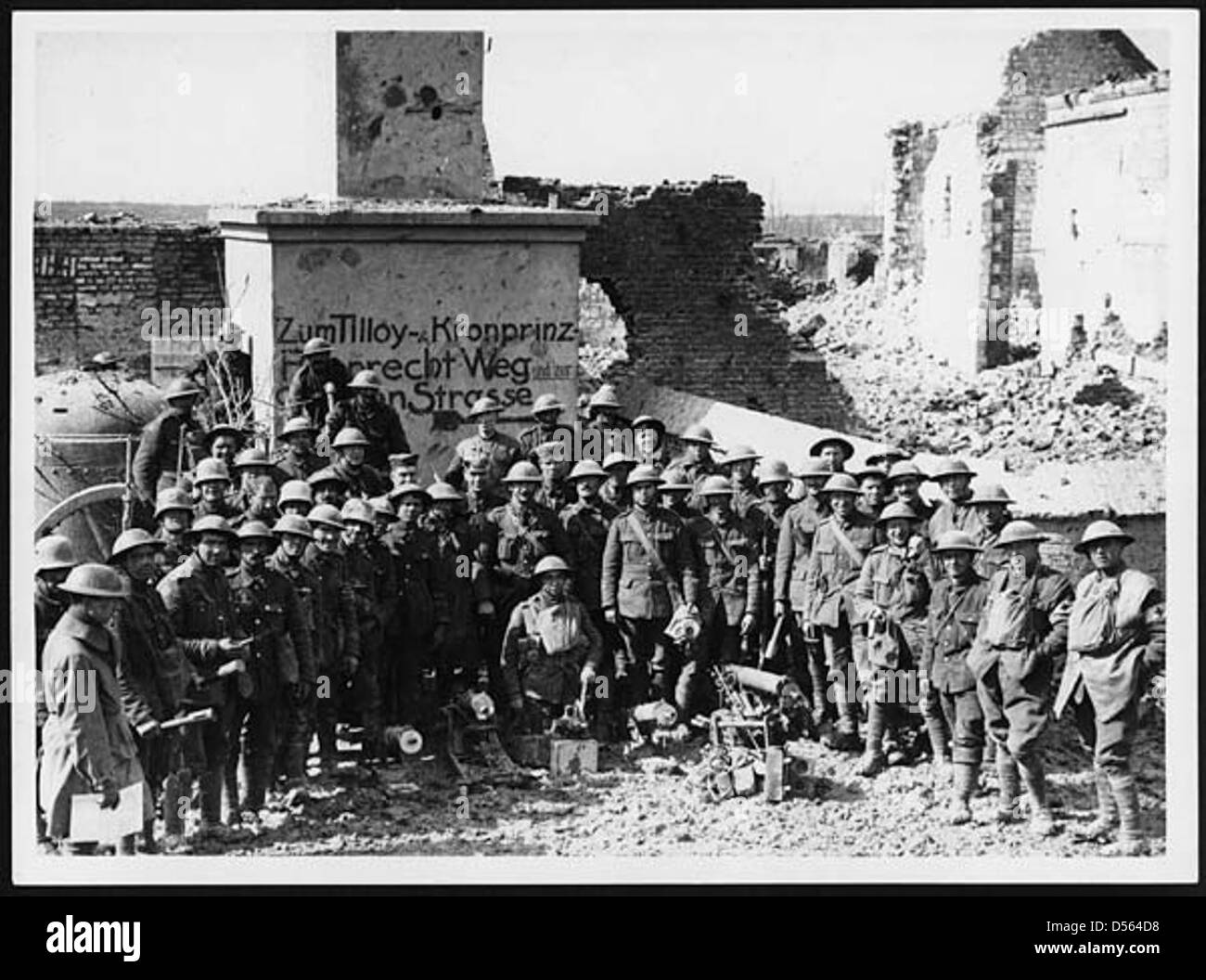 An officer and soldiers pose after capturing the village of Tilloy ...