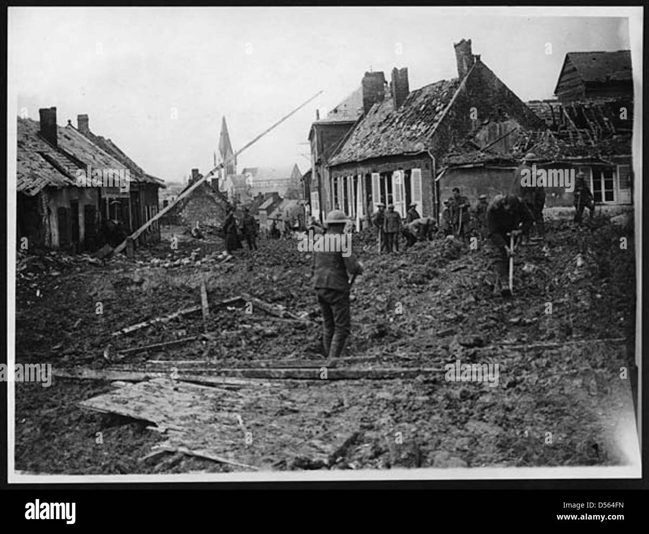 The town of Nesle shows the devastation of World War I, with buildings ...