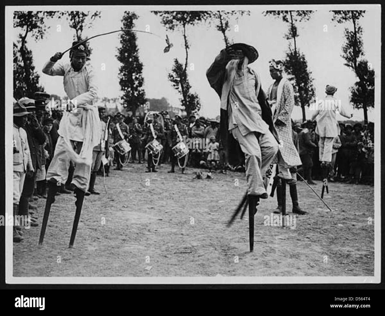 A display of soldiers on stilts during World War 1, used to demonstrate ...