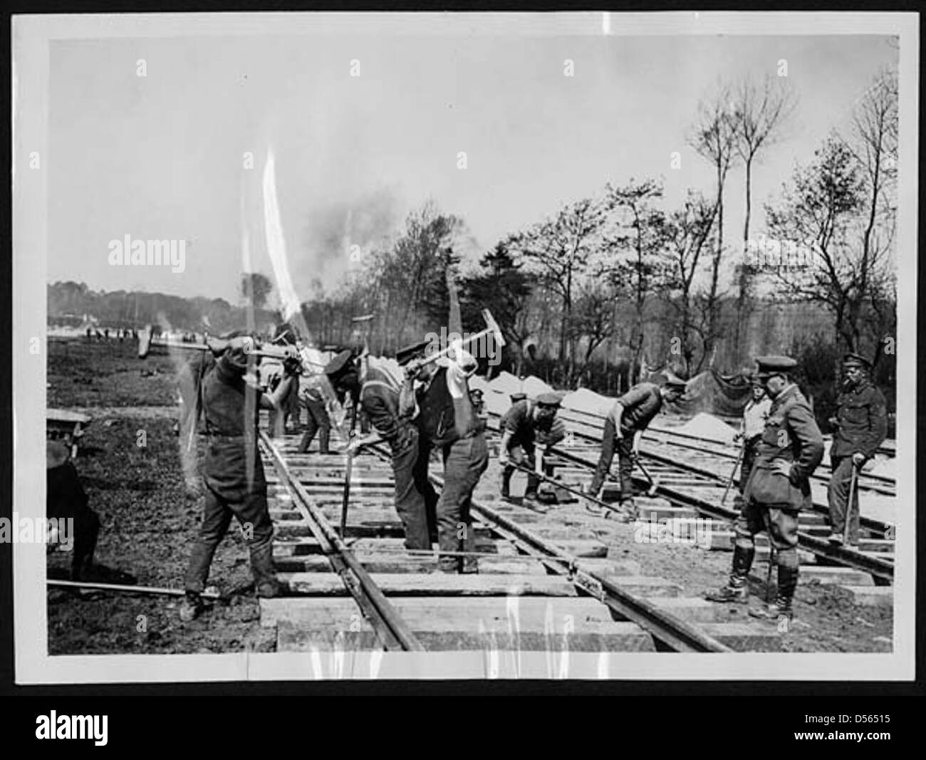 Soldiers repairing railway tracks during World War I, crucial for ...