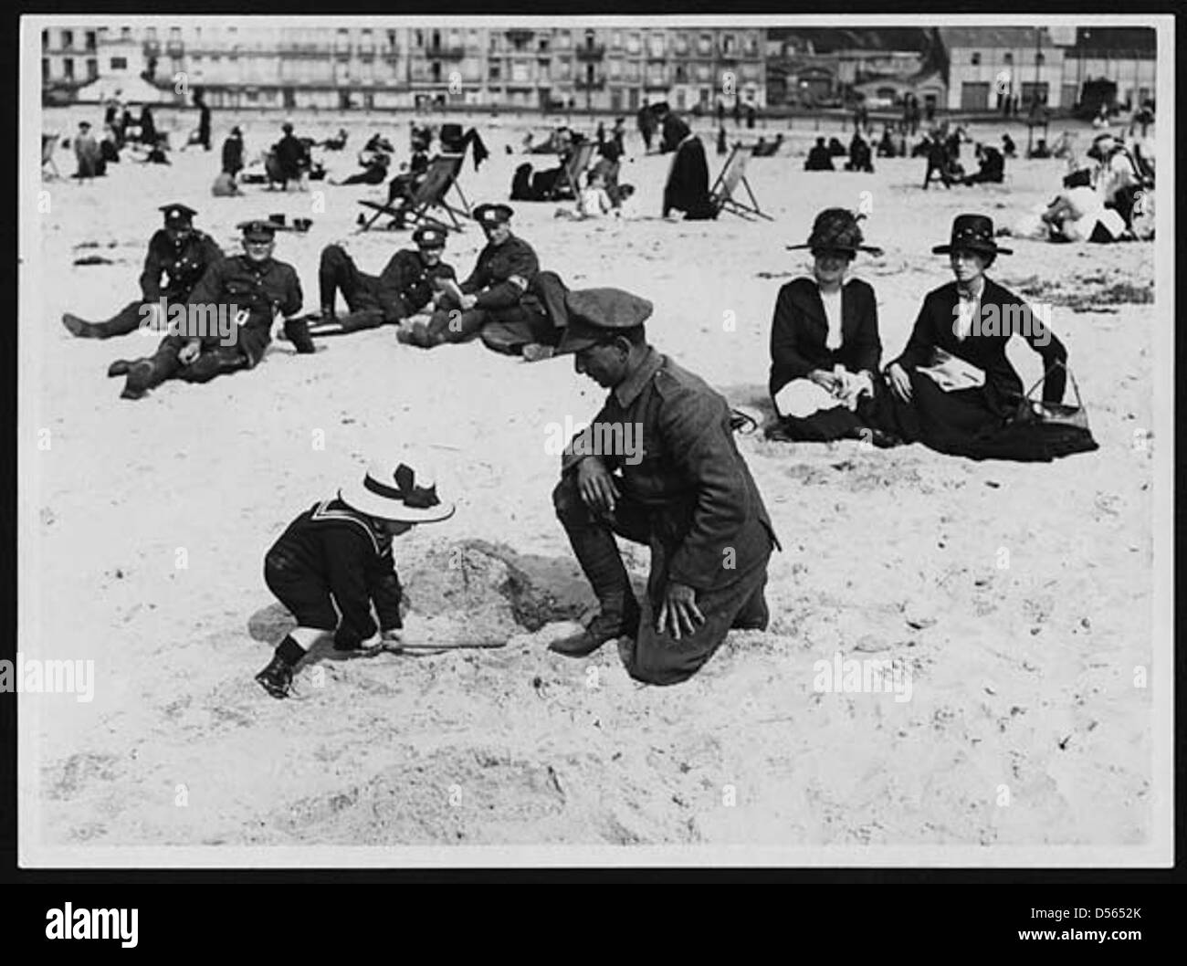 A photograph taken at a seaside resort during World War I, offering a ...