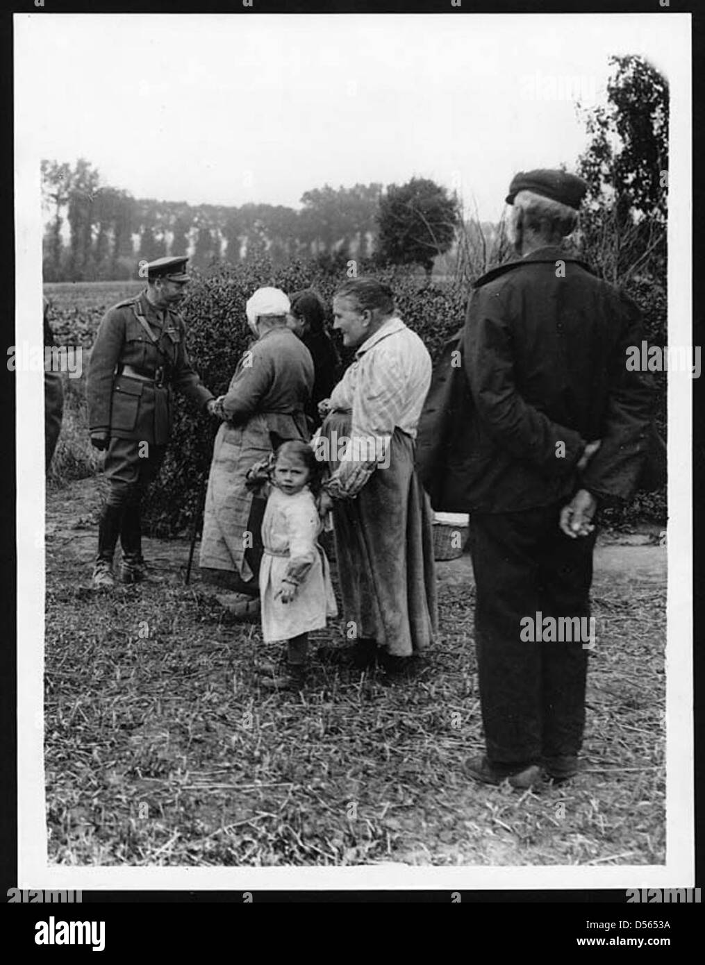 A photograph of His Majesty, presumably a British monarch, conversing ...