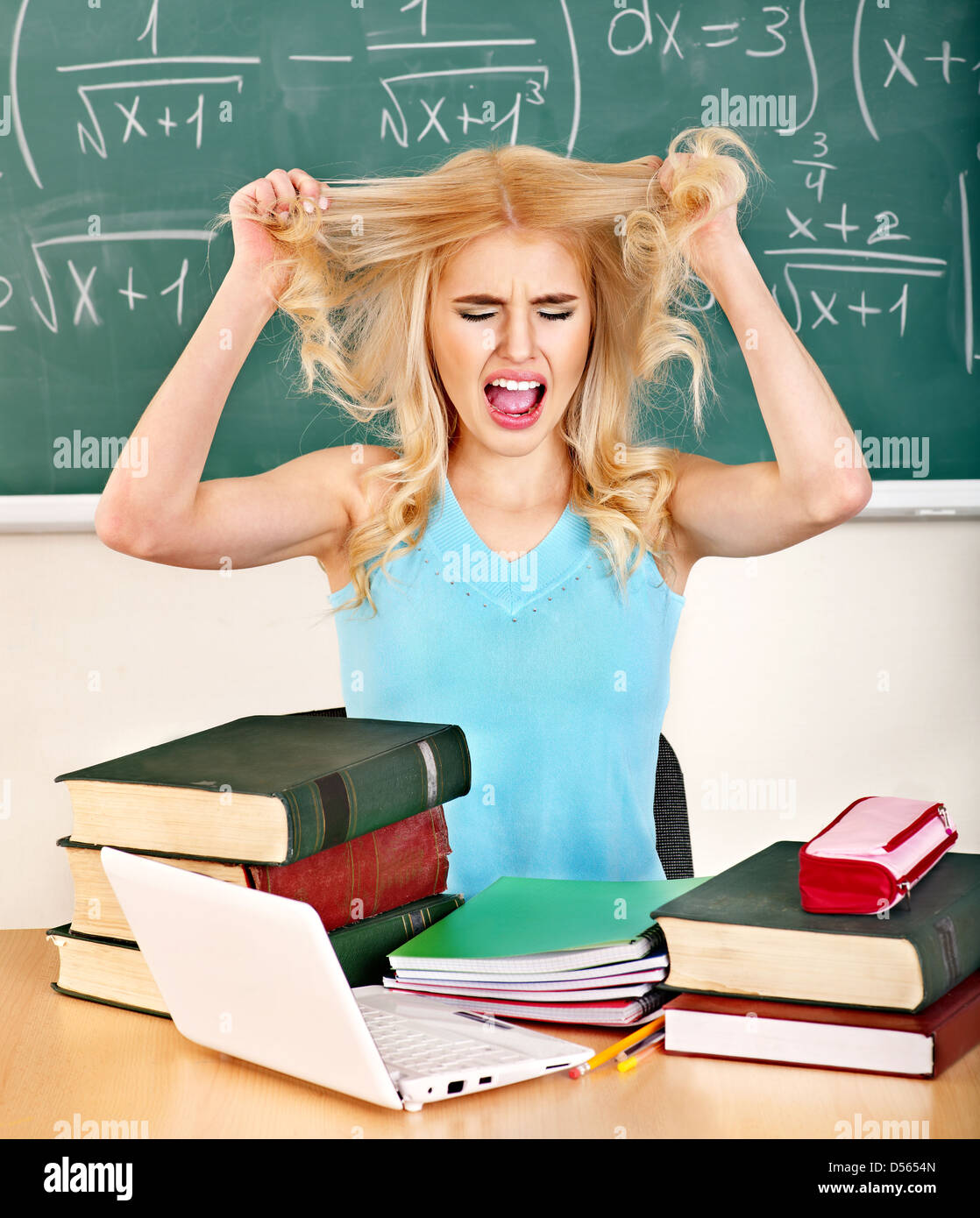 Woman in classroom Stock Photo - Alamy