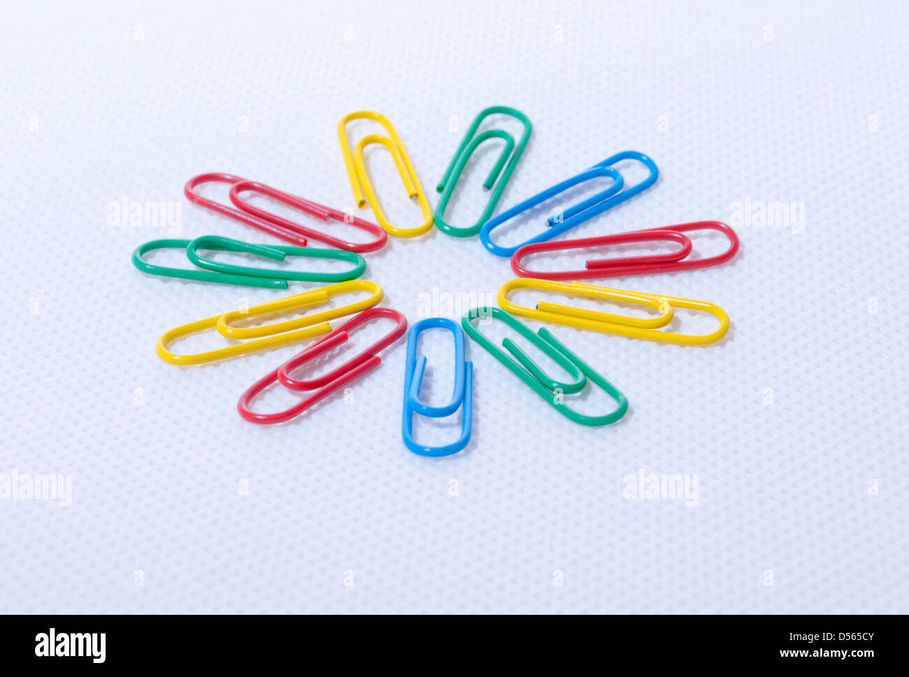 Color paper clips on the white background Stock Photo - Alamy