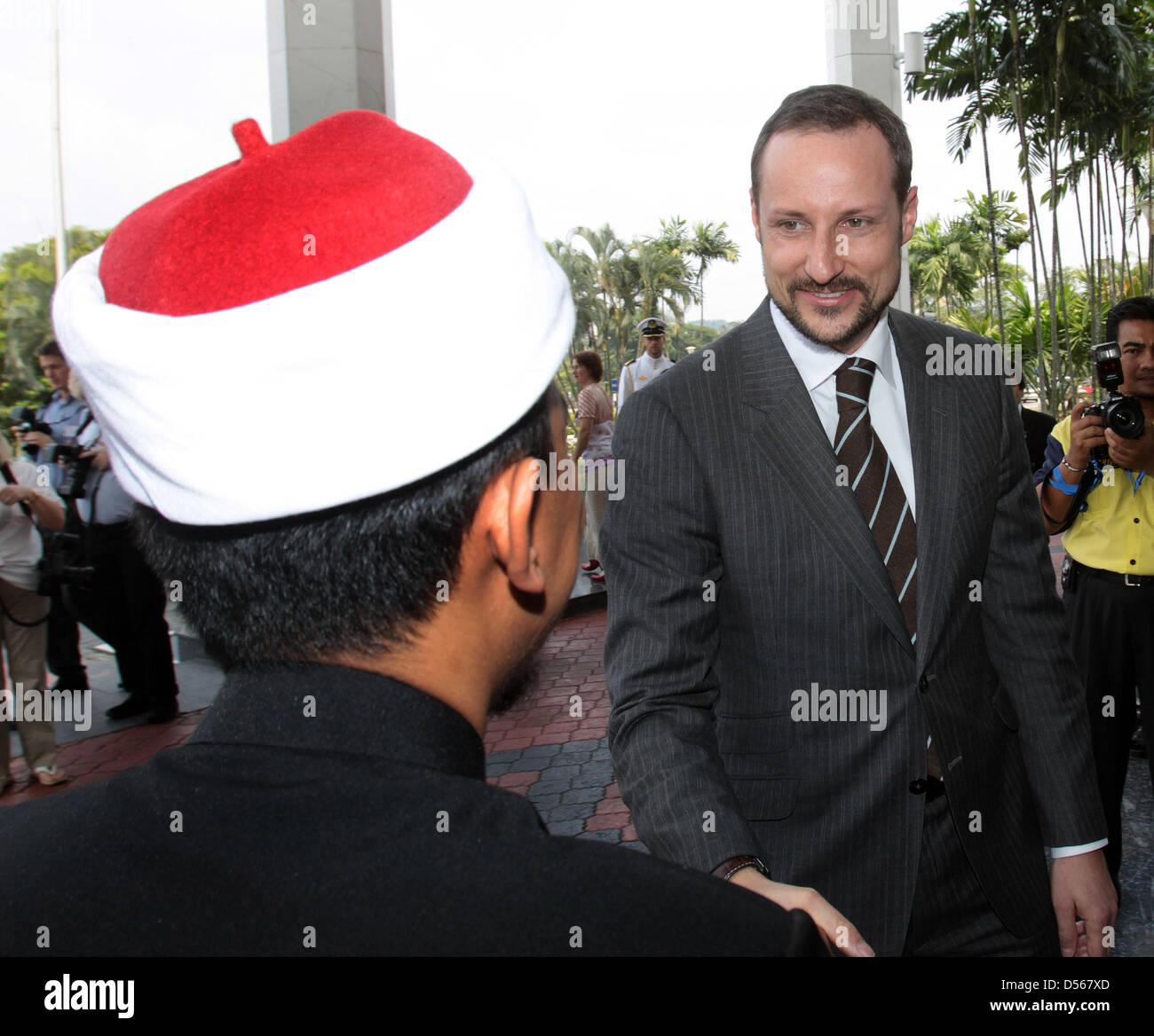 Crown Prince Haakon of Norway (R) arrives at the Blue Mosque at Shan ...