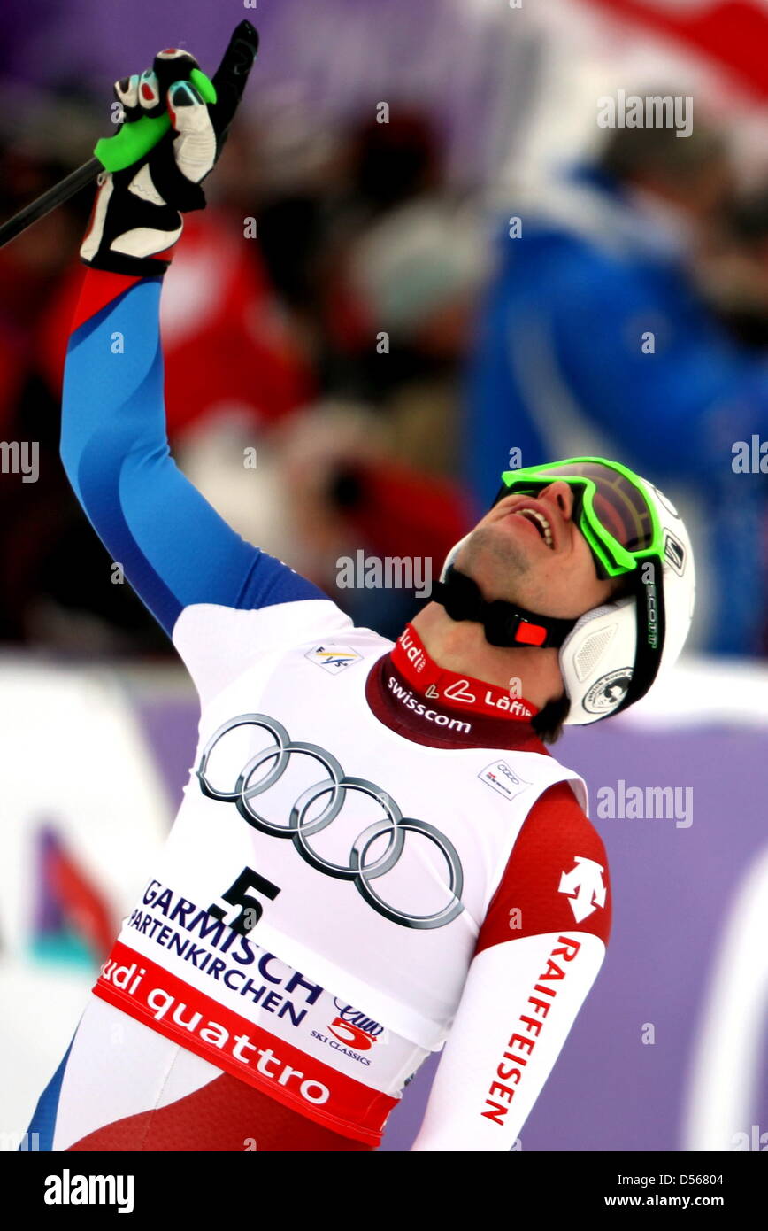 Swiss Patrick Kueng celebrates his shared third place at the downhill ...