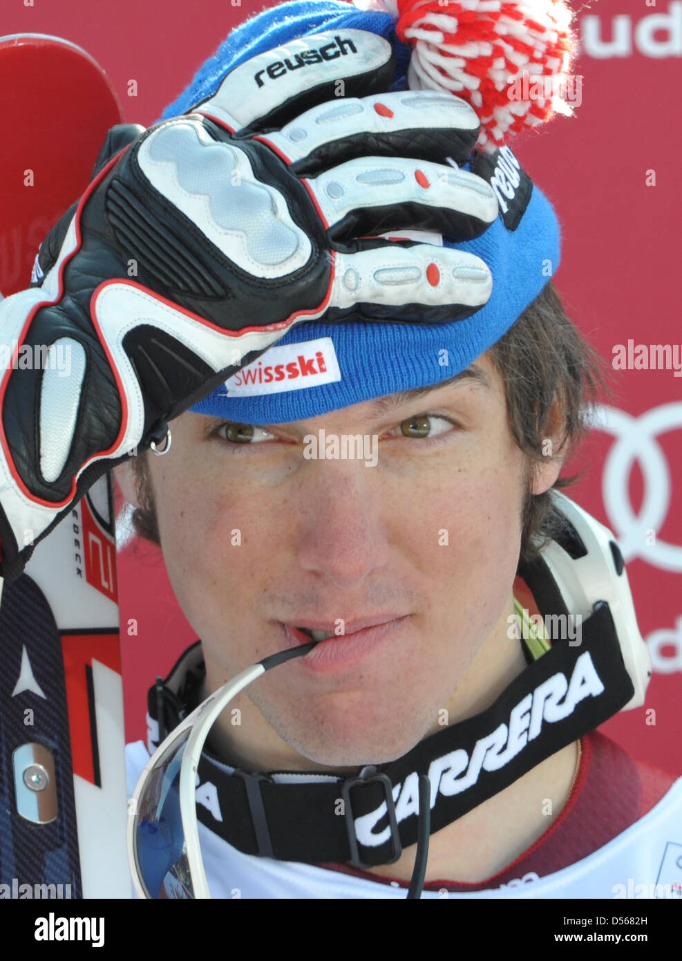 Swiss Carlo Janka celebrates his victory at the downhill event at the ...