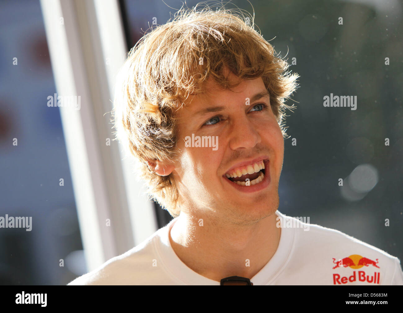 German Formula One driver Sebastian Vettel of Team Red Bull speaks with ...