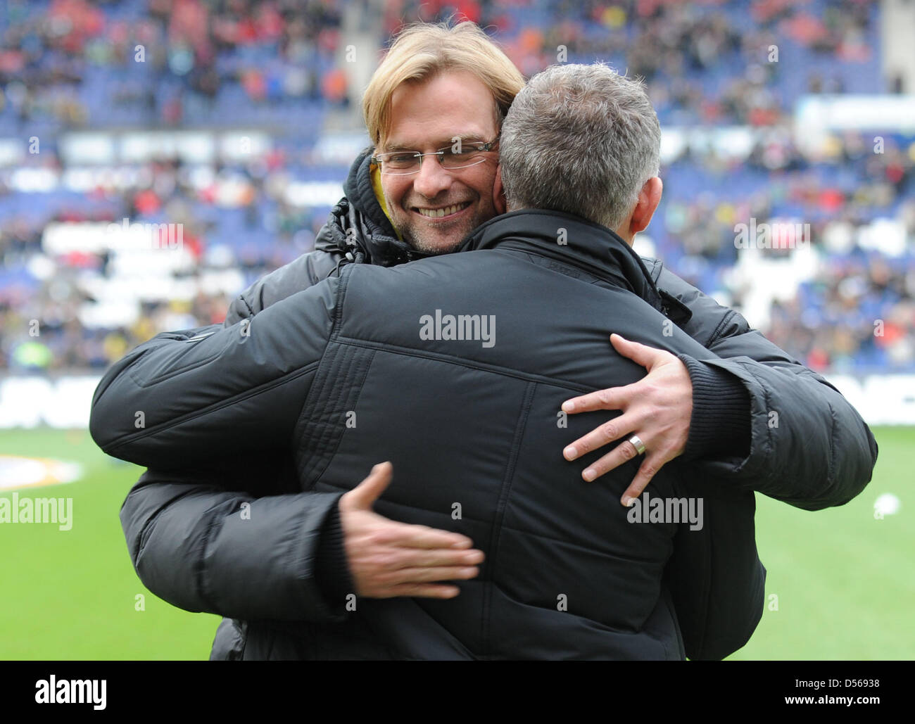 Hanover's head coach Mirko Slomka (R) and Domrtund's head coach Juergen ...