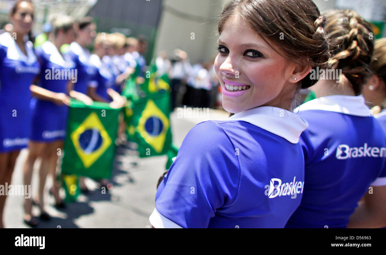 Grid girls line up for the drivers' parade at Autodromo Jose Carlos ...