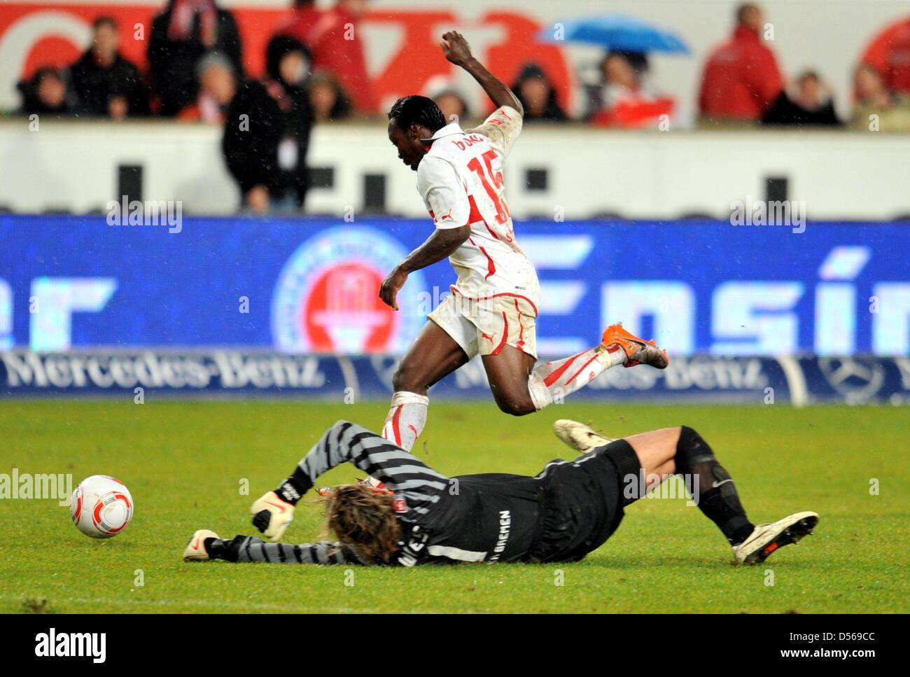 Stuttgart's Arthur Boka (top) Puts the 6-0 past Bremen's goalie Tim ...