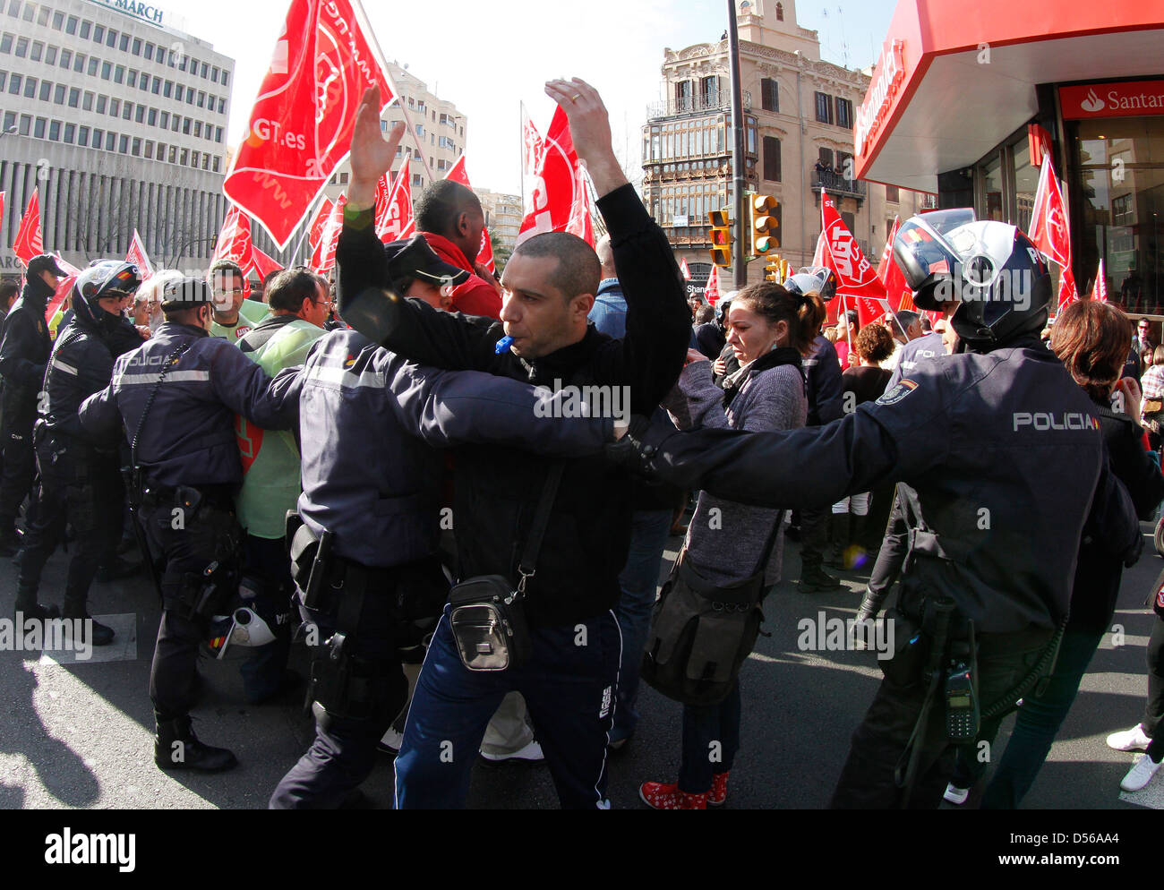 Demonstrators protest during a general strike day against cuttings on ...